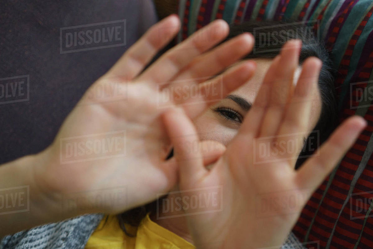 Portrait shy woman with hands in front of face - Royalty-free Stock ...