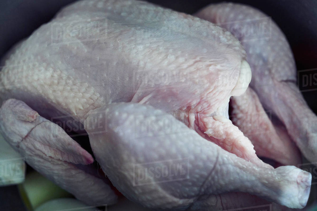 Close up raw chicken - Royalty-free Stock Photo | Dissolve