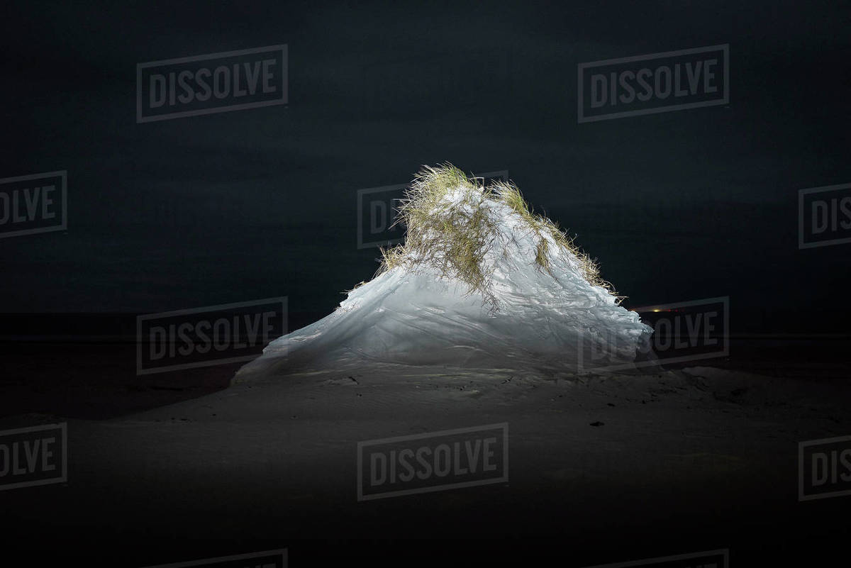 Sand dune illuminated at night - Royalty-free Stock Photo | Dissolve