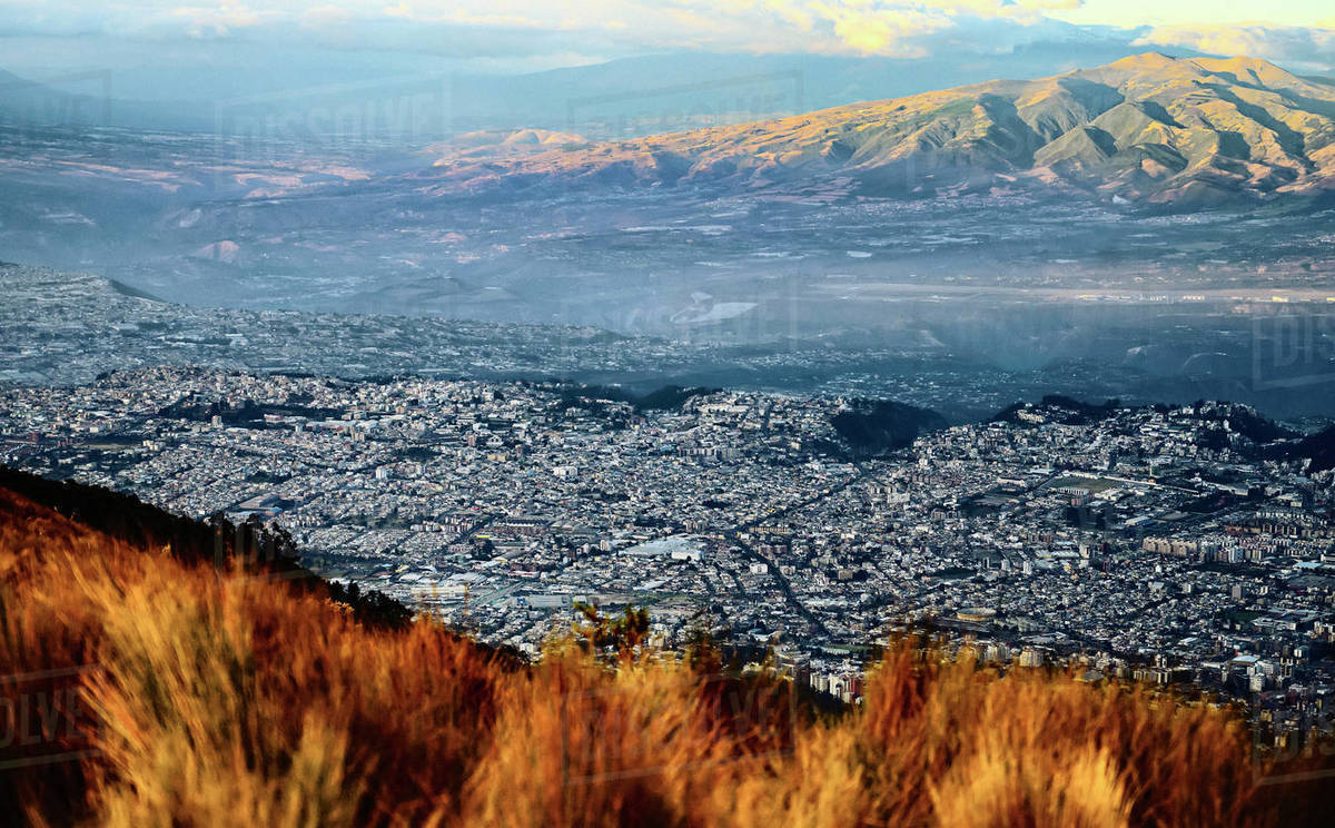 Aerial view Quito cityscape and mountains, Ecuador - Stock Photo - Dissolve