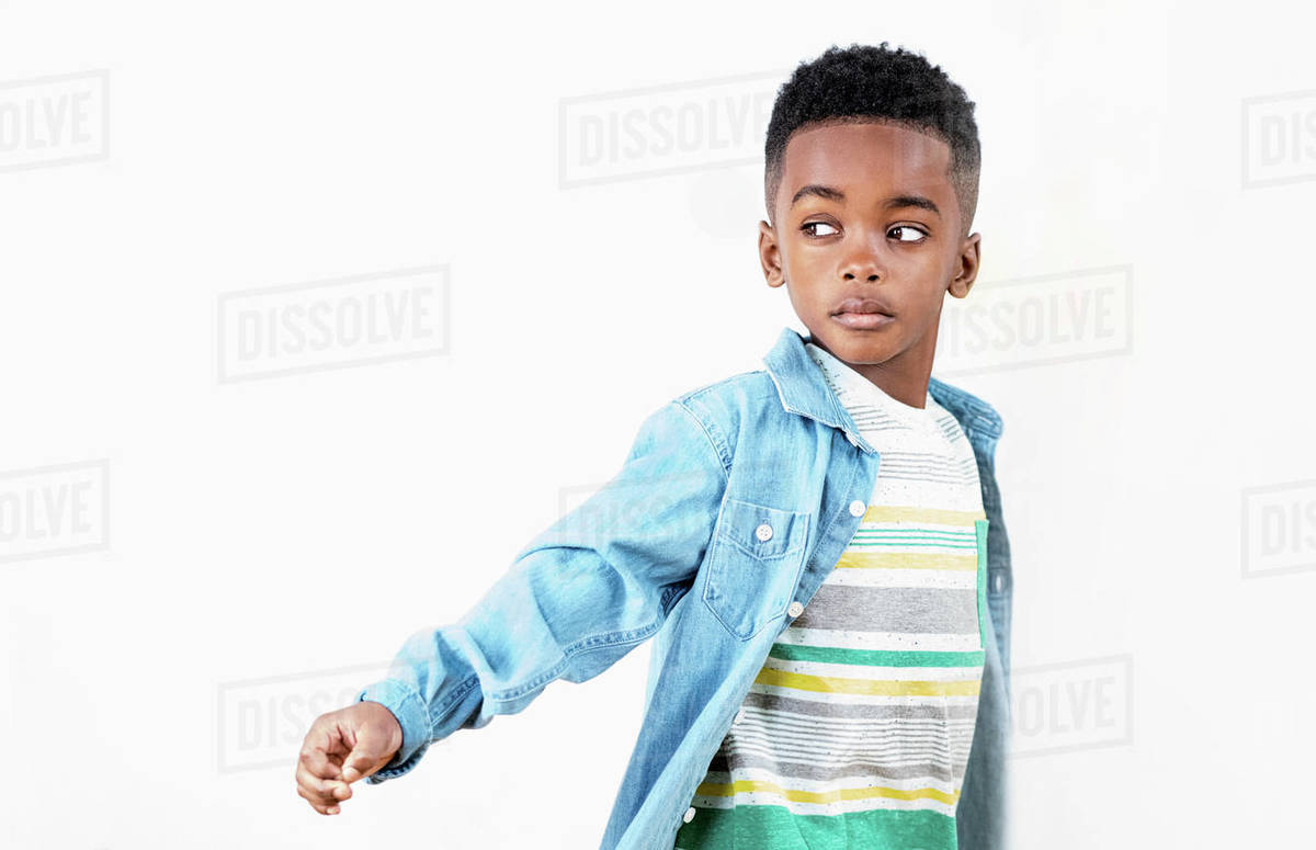 Portrait cool boy looking over shoulder - Royalty-free Stock Photo ...