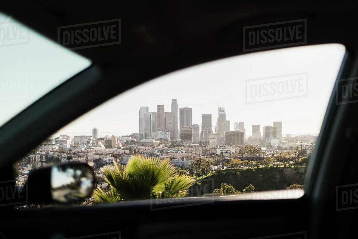View of sunny cityscape out car window, Los Angeles, California, USA ...