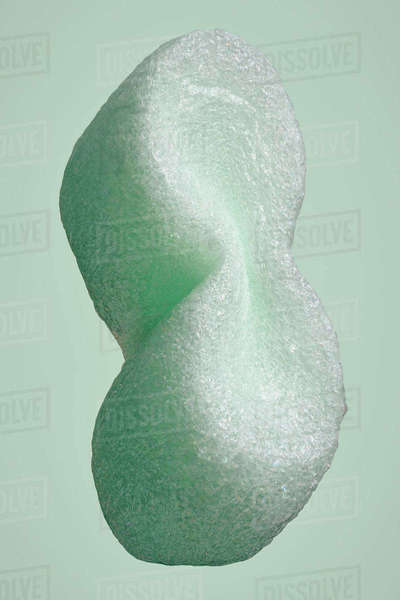 Close up green Styrofoam packaging peanut - Royalty-free Stock Photo ...