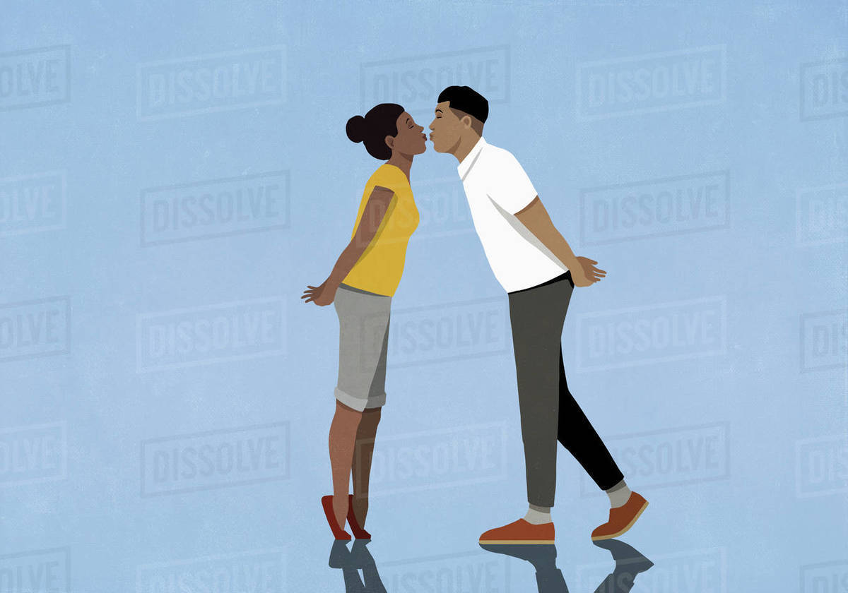 Couple kissing face to face on blue background - Stock Photo - Dissolve