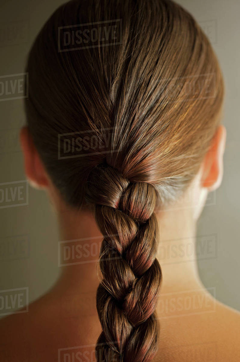 Back view of young woman head with one braid - Royalty-free Stock Photo ...