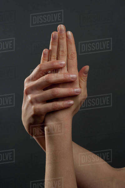 A hand holding another hand - Royalty-free Stock Photo | Dissolve
